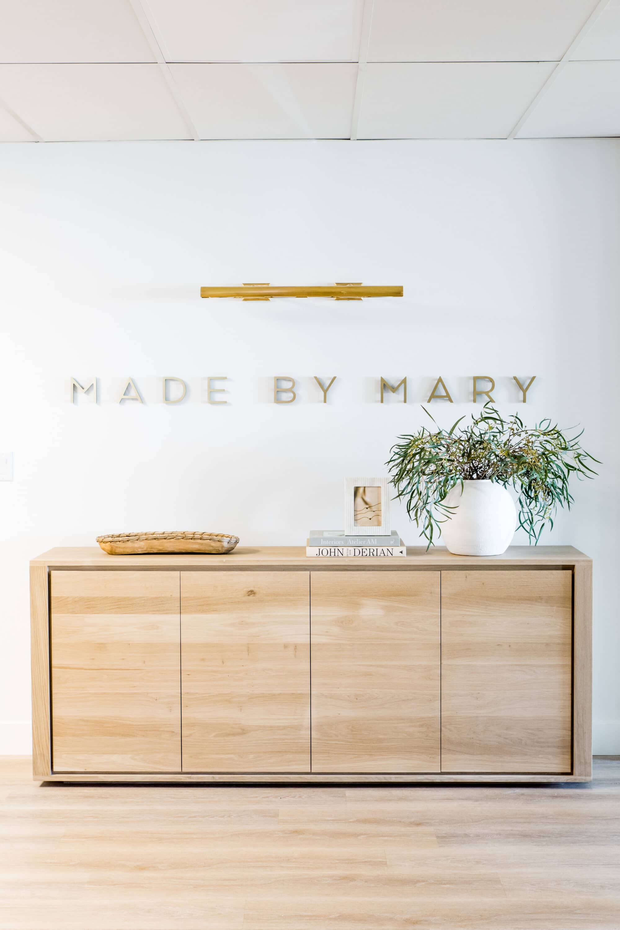 Thoughtful Storage and Warm Decor Make This Chic Office Feel Like a ...