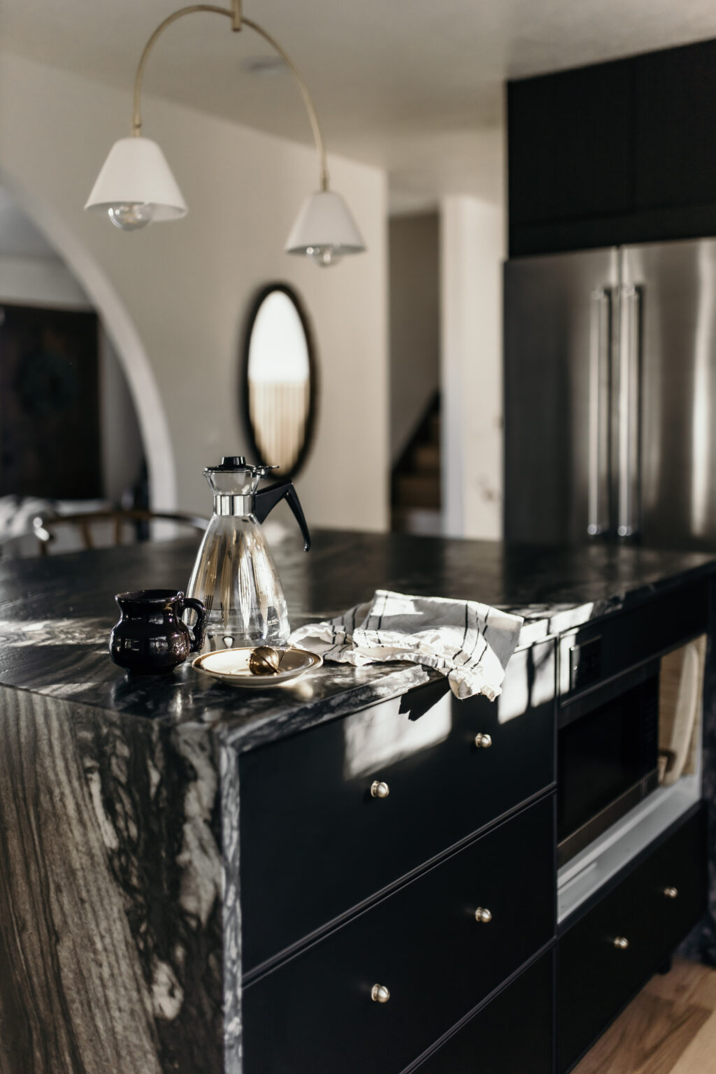 You'll Want To Steal the Look of This Midcentury Black Kitchen
