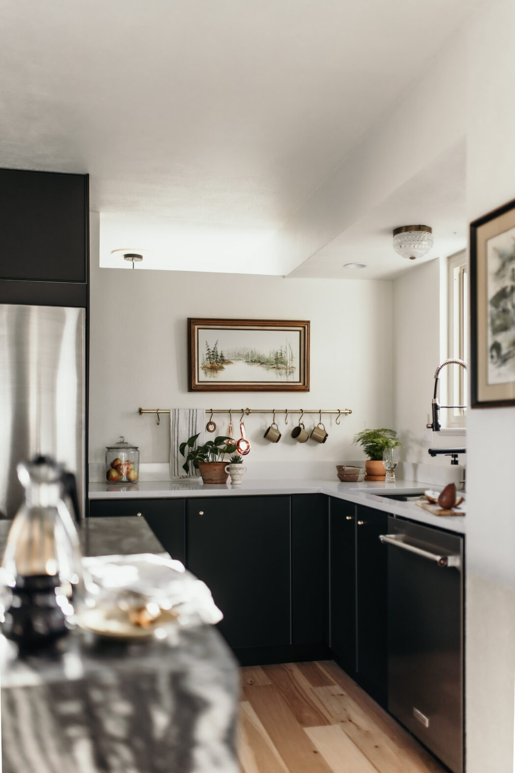 You'll Want To Steal the Look of This Midcentury Black Kitchen