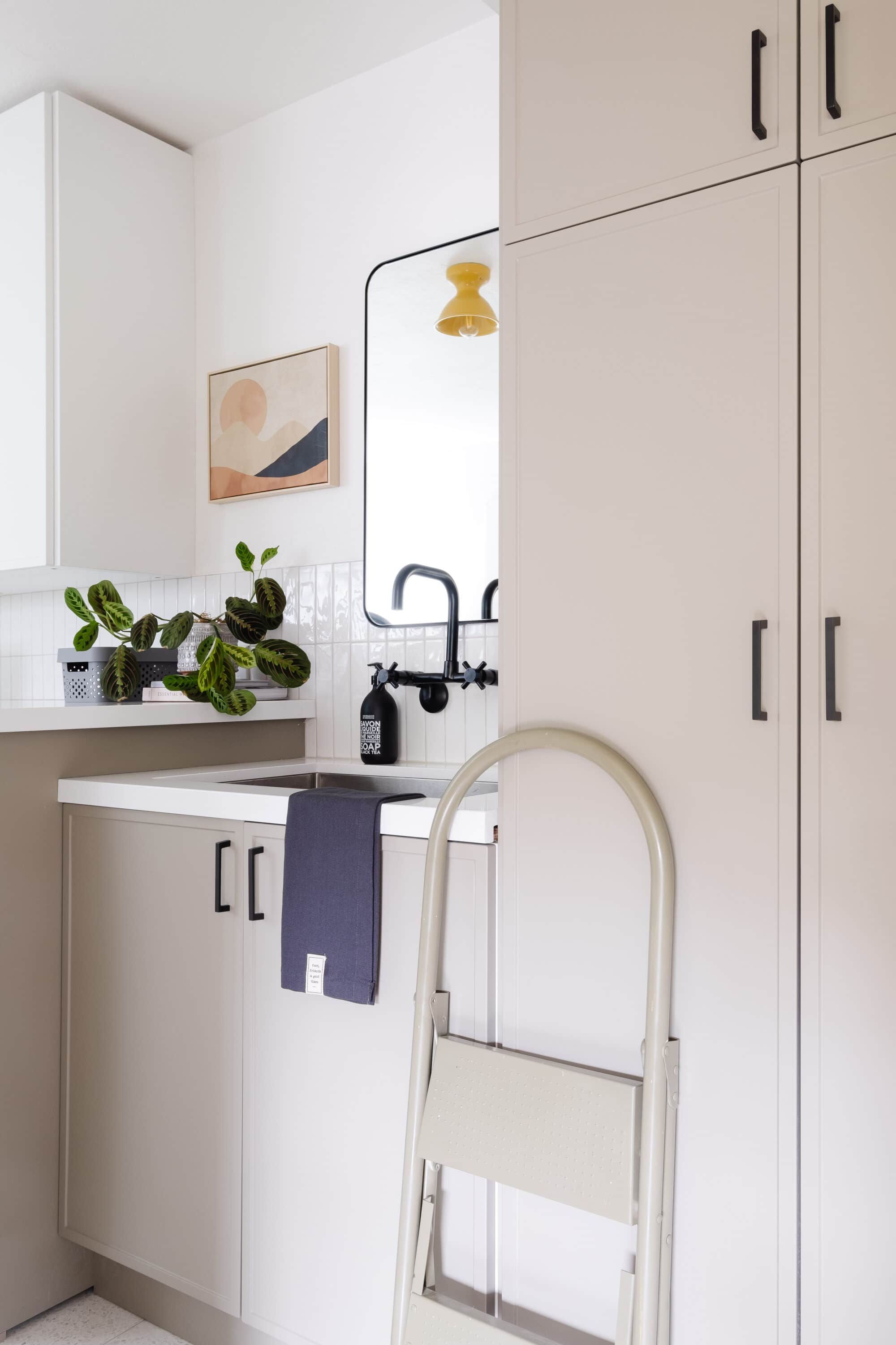 Inside a Two-Tone, Quarterline Laundry Room Renovation